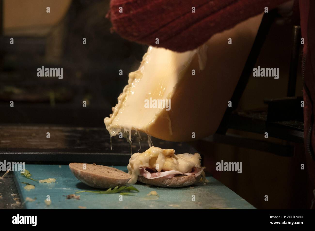 Raclette panini melted swiss cheese sandwich Stock Photo - Alamy