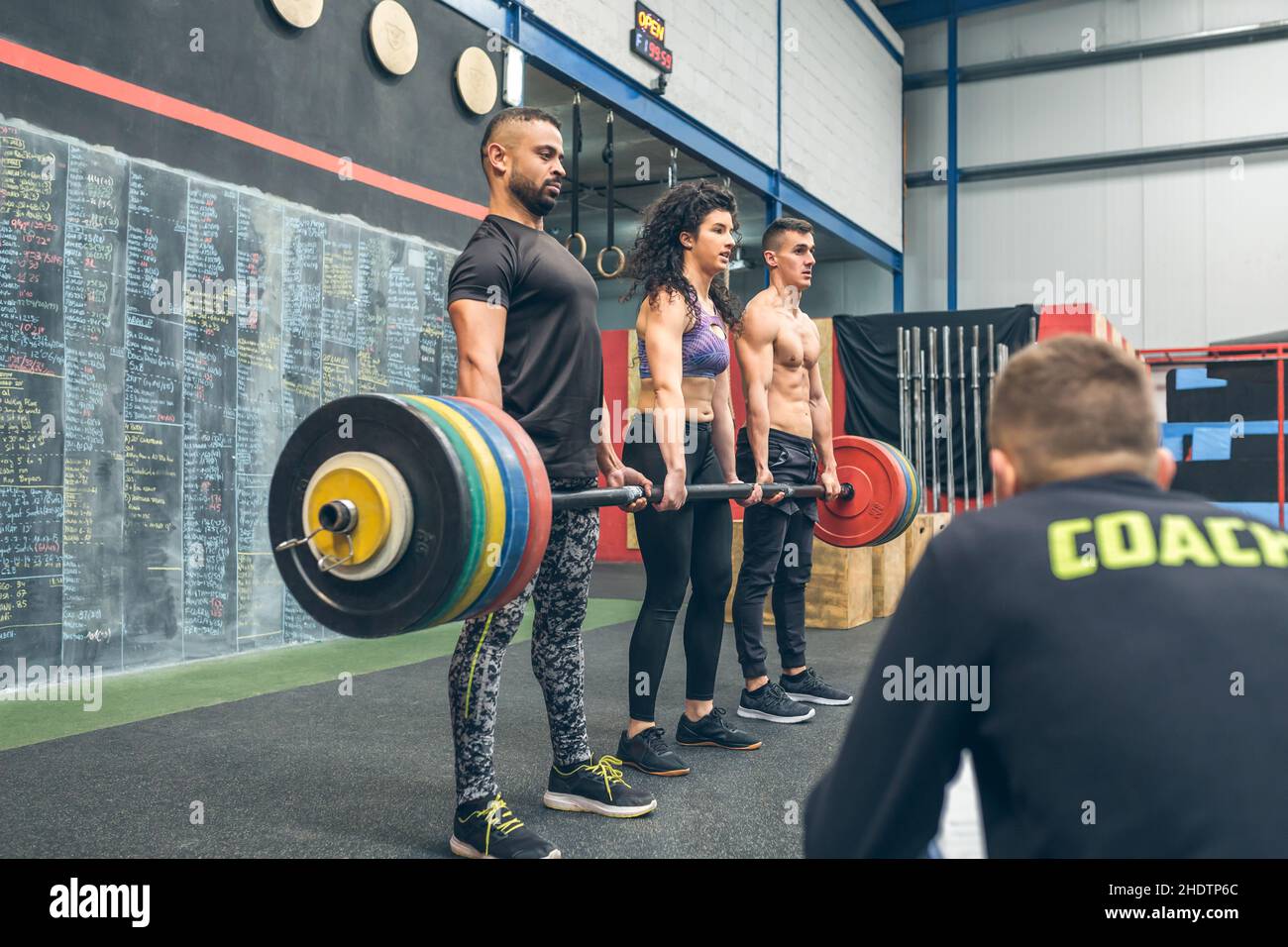 Female coach in gym hi-res stock photography and images - Alamy