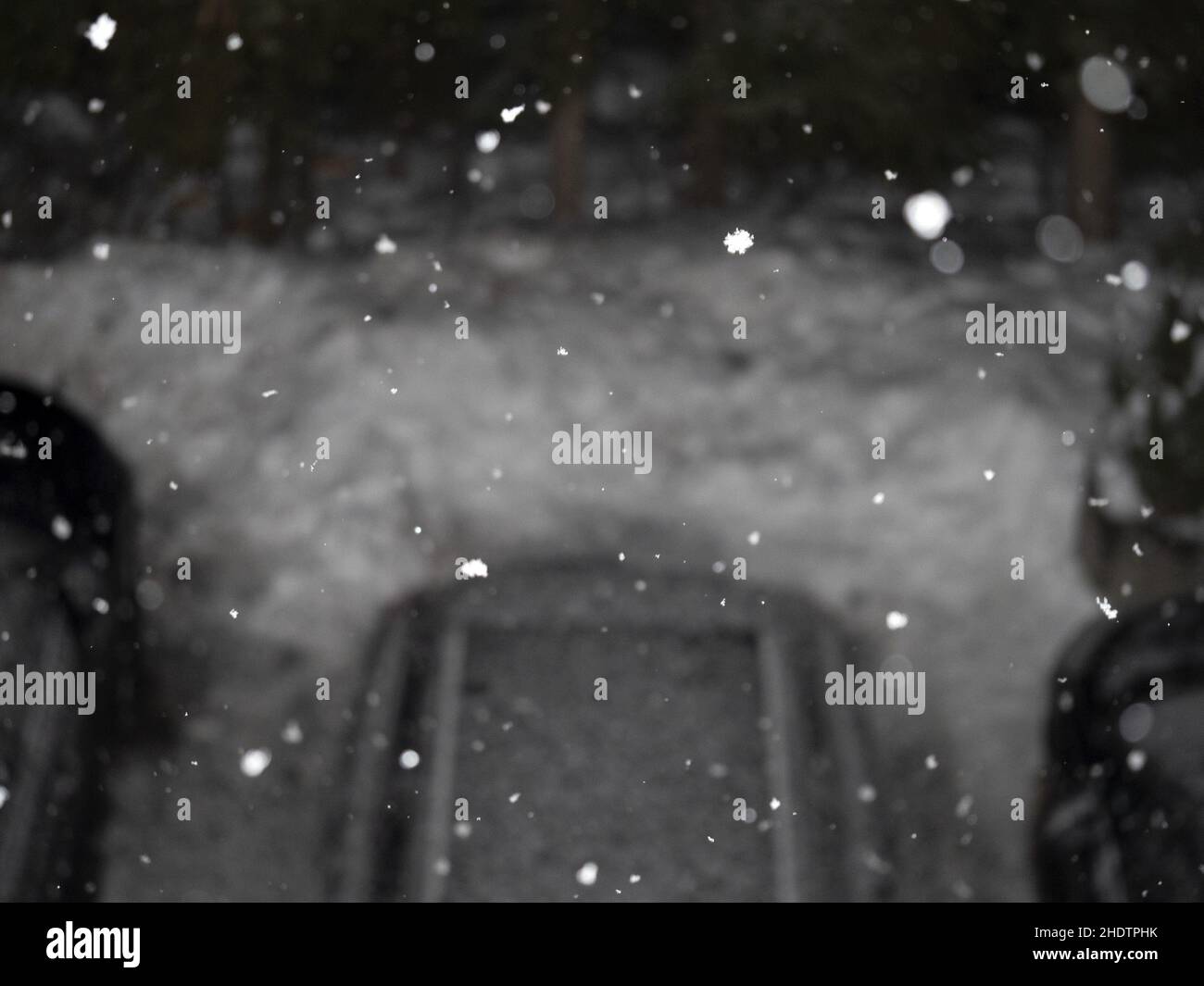 snow falling snowing at night in dolomites mountains car park Stock ...