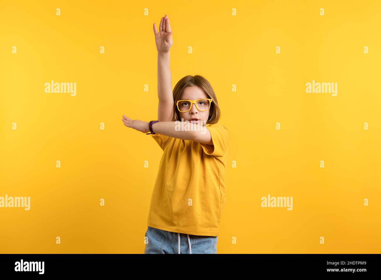 Smart Little Kid Girl 8-10 Years Old in Yellow T-shirt and Eyeglasses ...