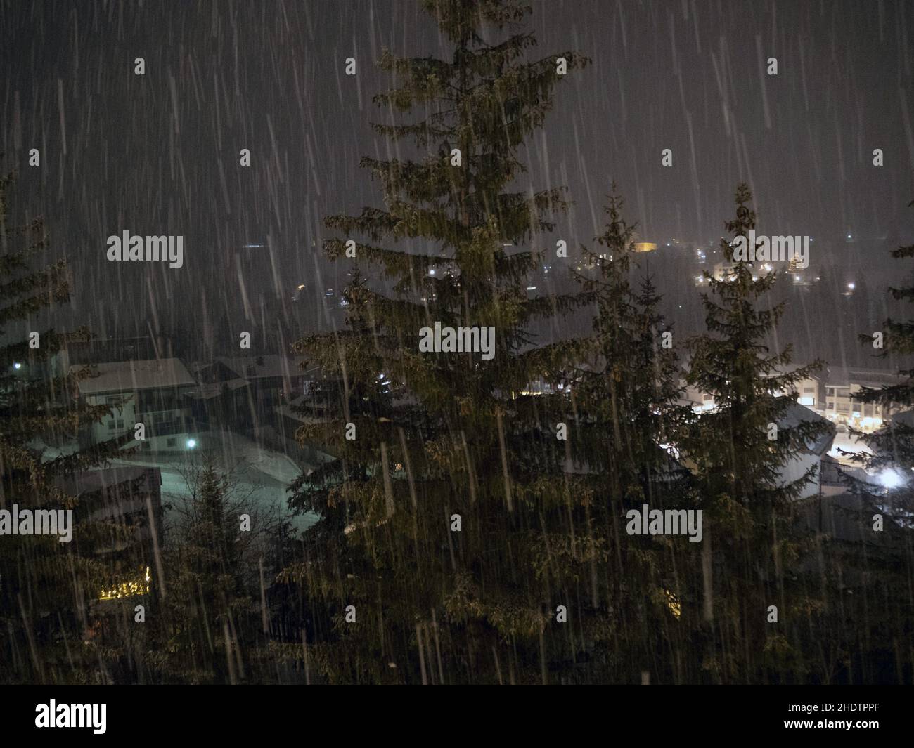 snow falling snowing at night in dolomites mountains Stock Photo - Alamy