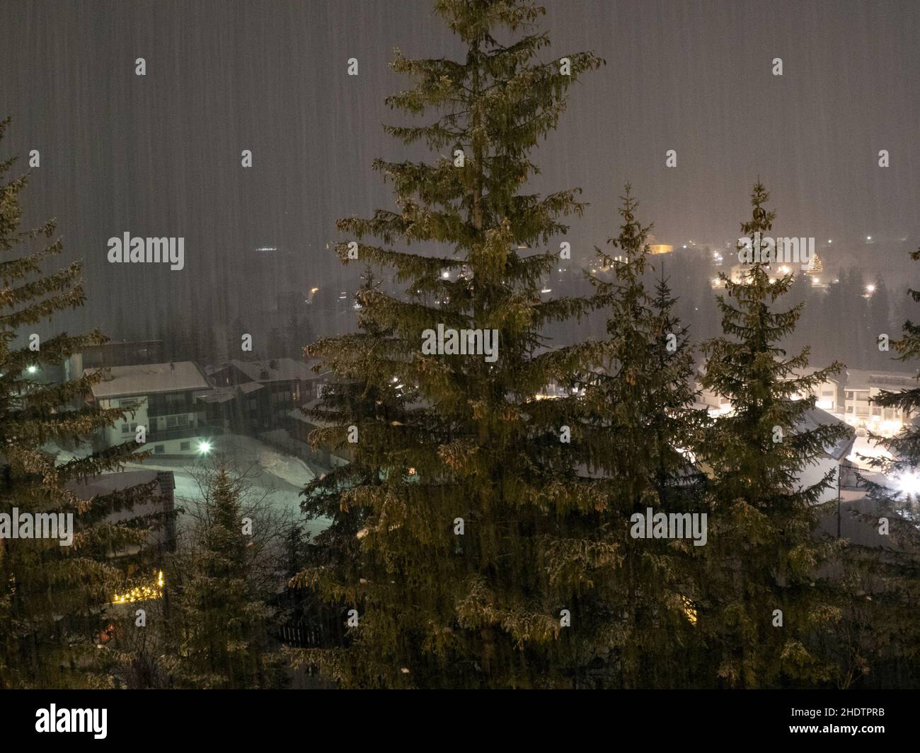 snow falling snowing at night in dolomites mountains Stock Photo - Alamy