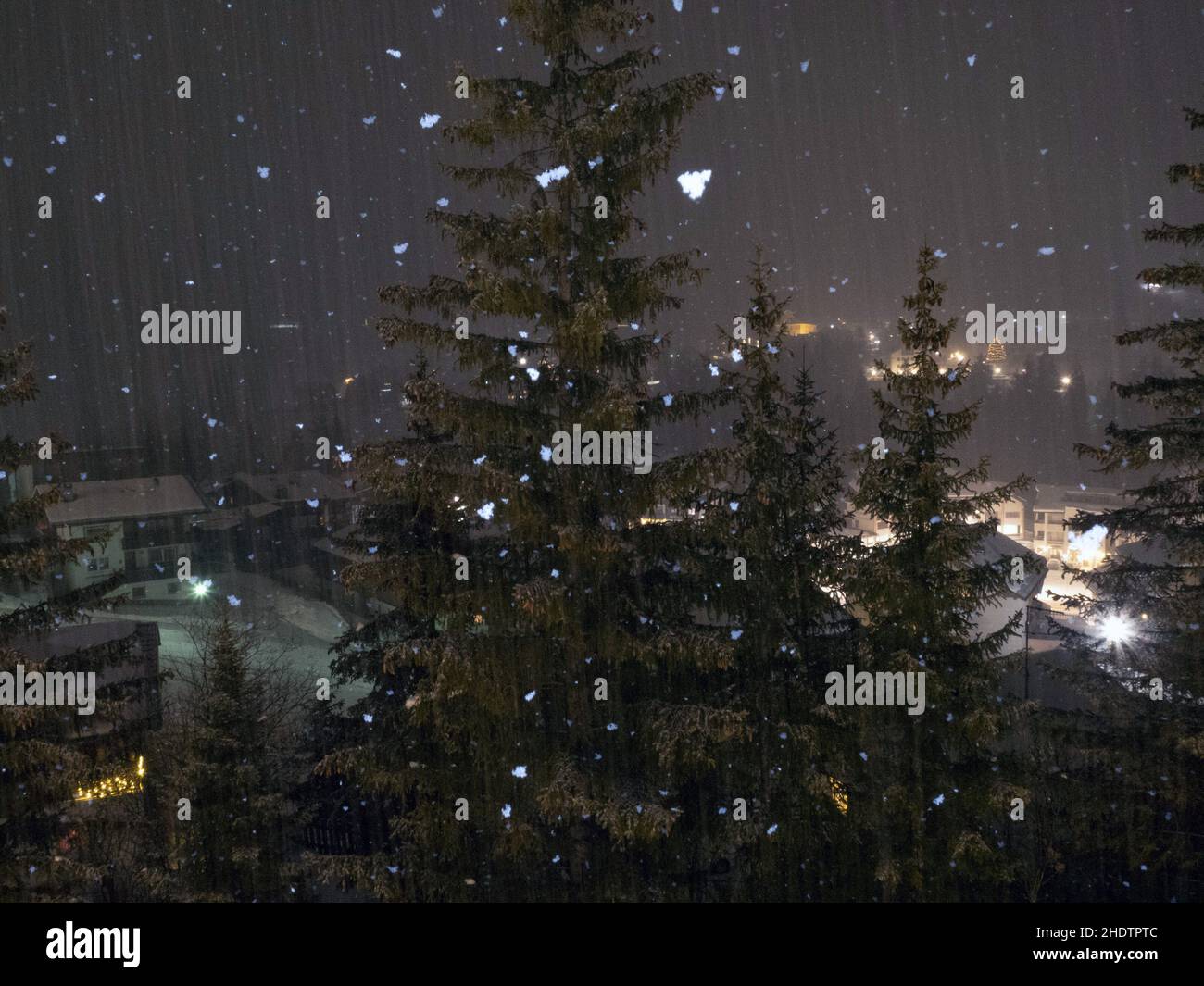 snow falling snowing at night in dolomites mountains Stock Photo - Alamy