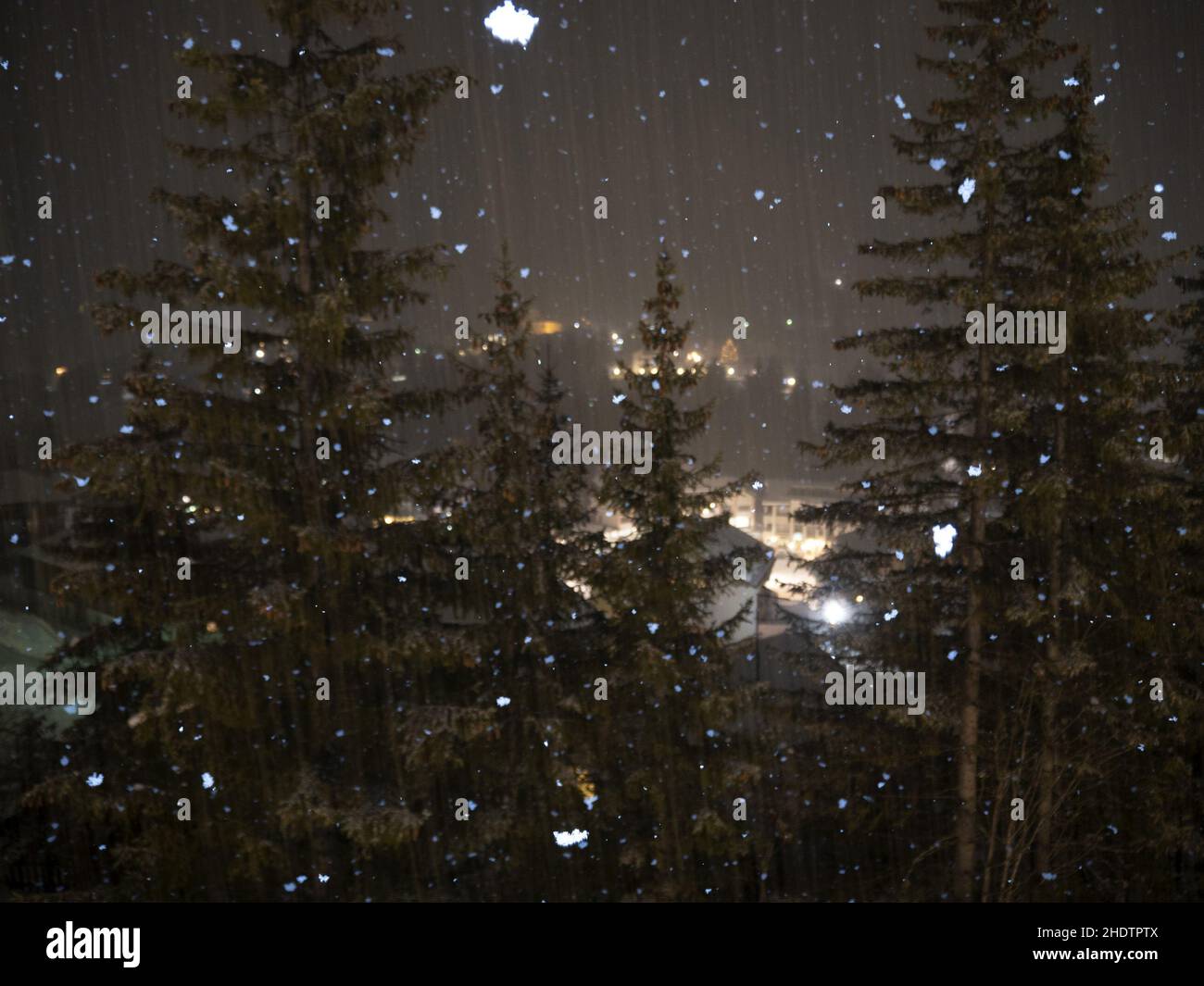 snow falling snowing at night in dolomites mountains Stock Photo - Alamy