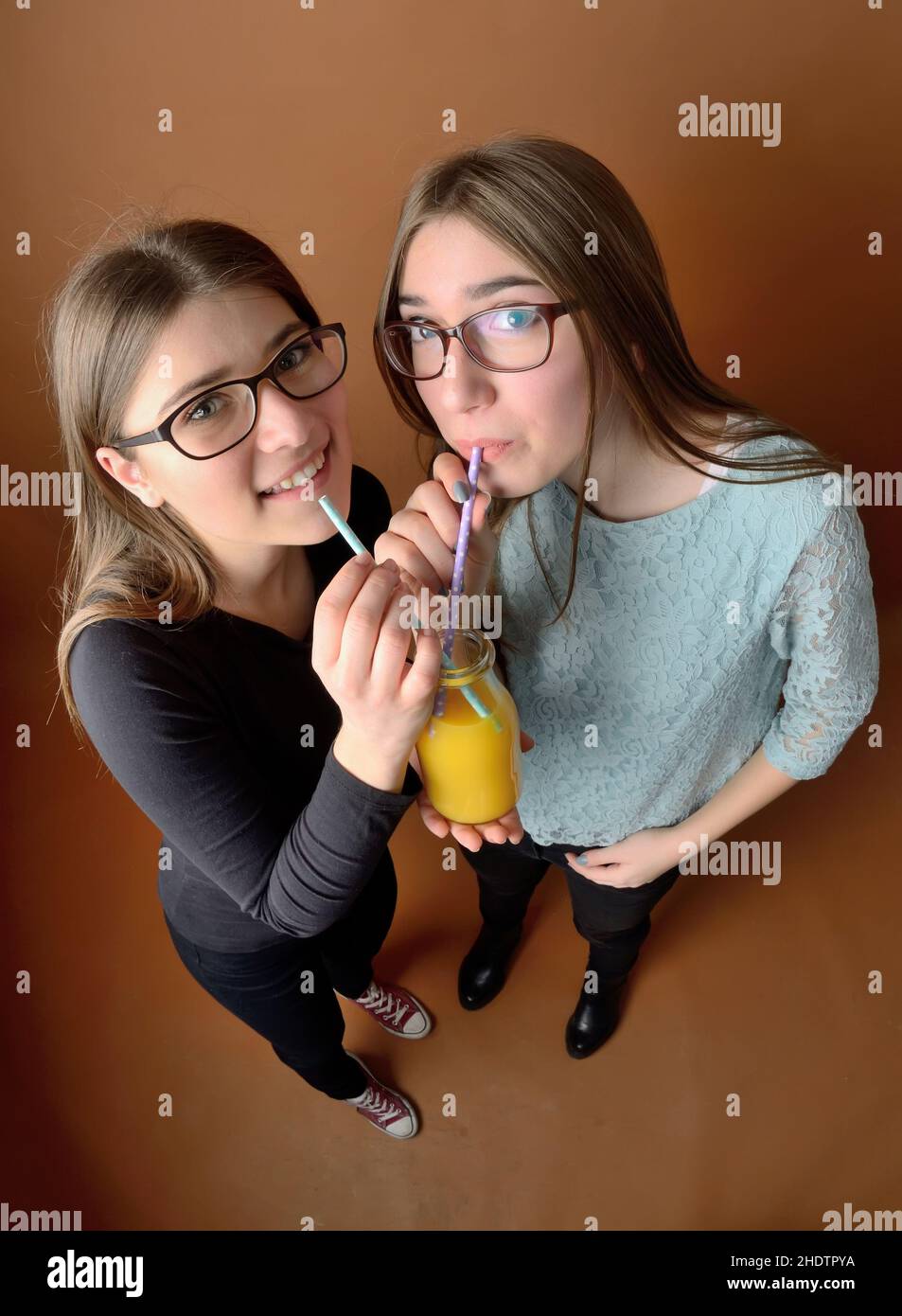 Adult with 2 teenagers drinking hi-res stock photography and images - Alamy
