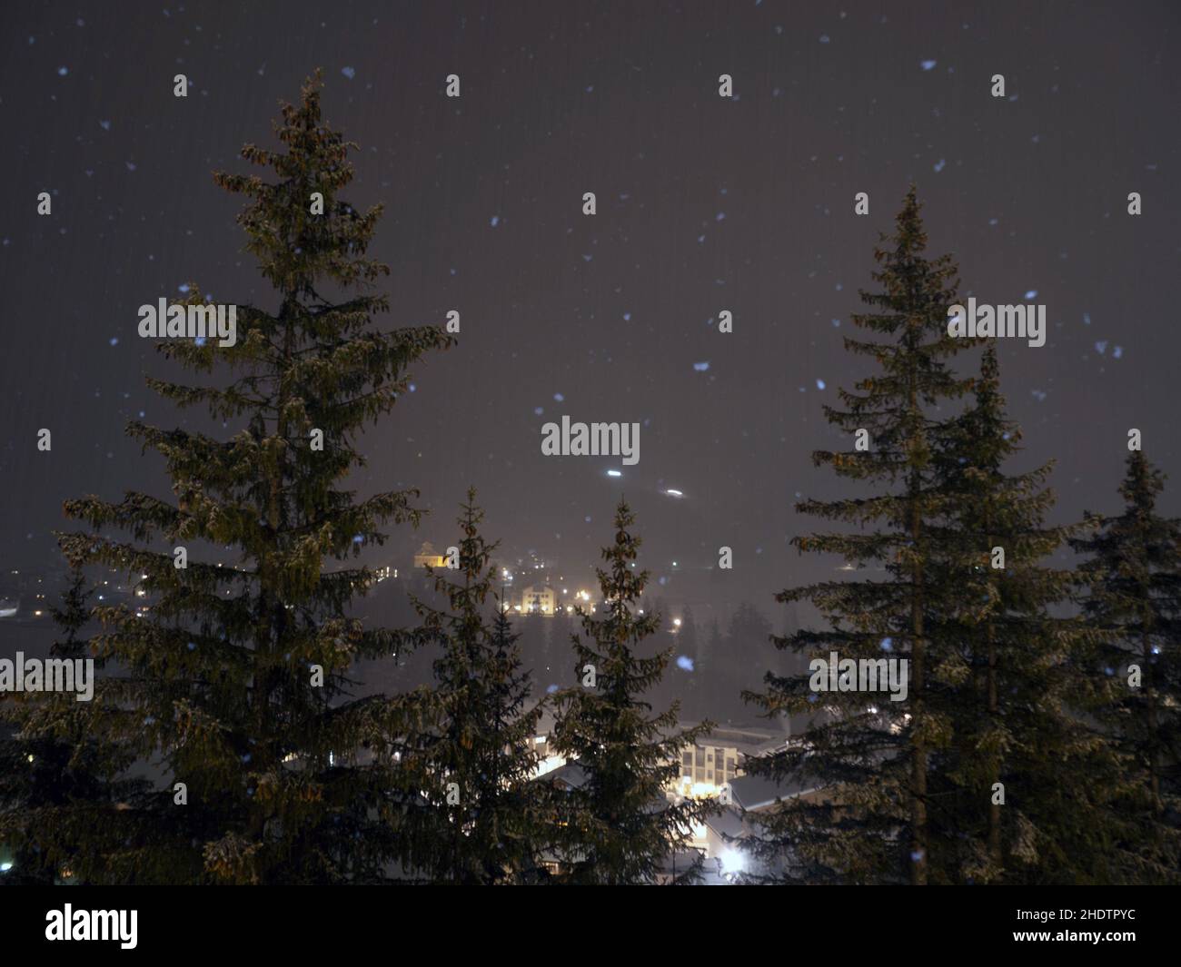 snow falling snowing at night in dolomites mountains Stock Photo - Alamy
