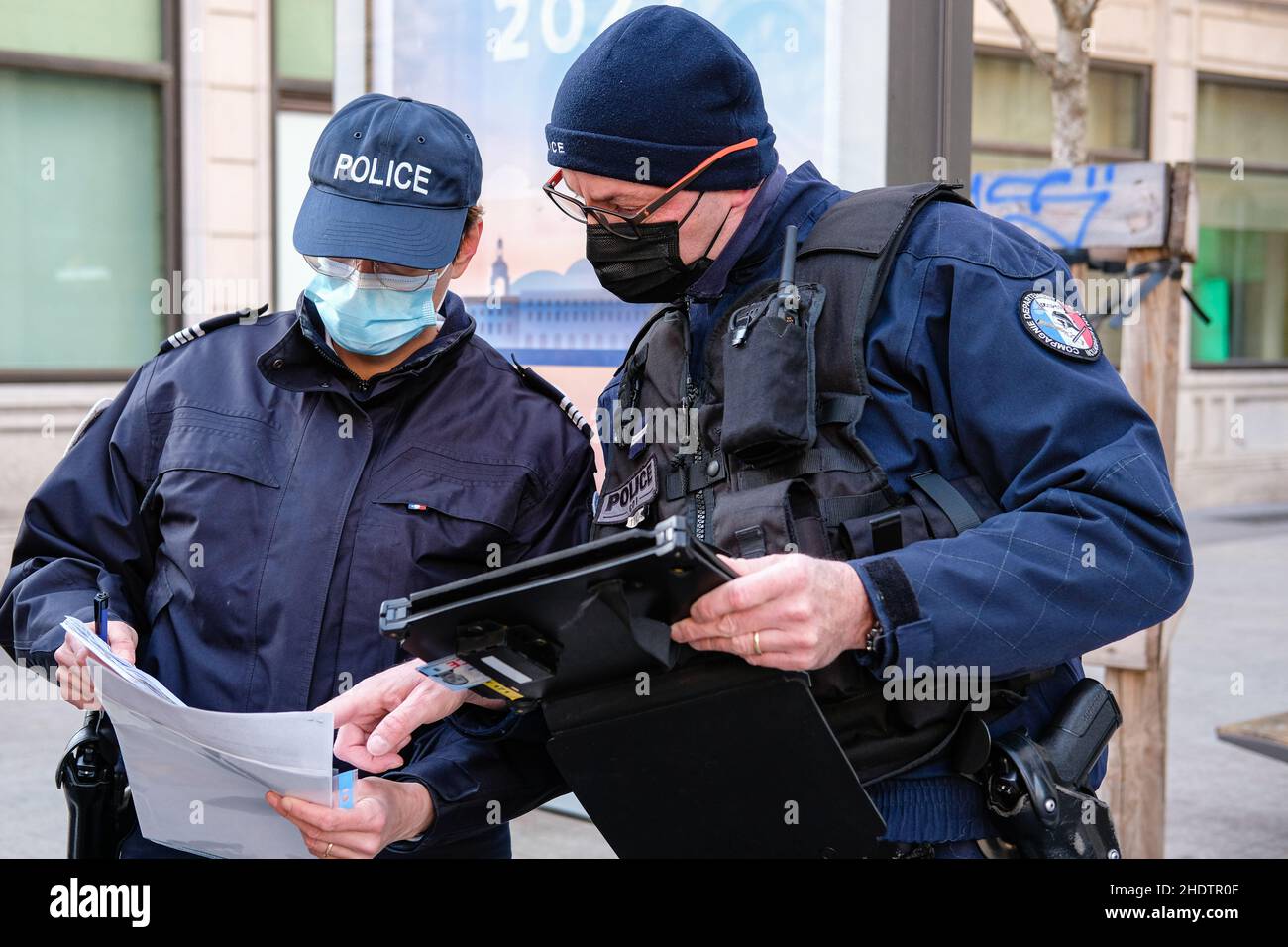 Lyon (France), 6 January 2022. Two policemen who are fining during a ...