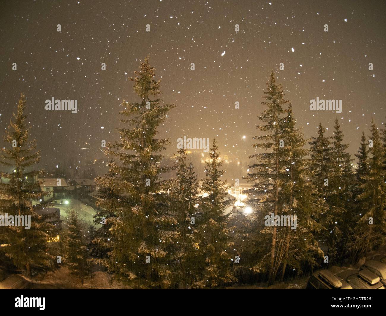 snow falling snowing at night in dolomites mountains Stock Photo - Alamy