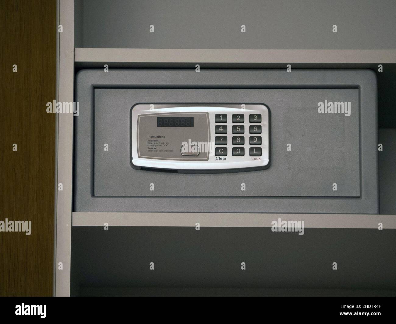 Hotel room electronic safe locker Stock Photo - Alamy