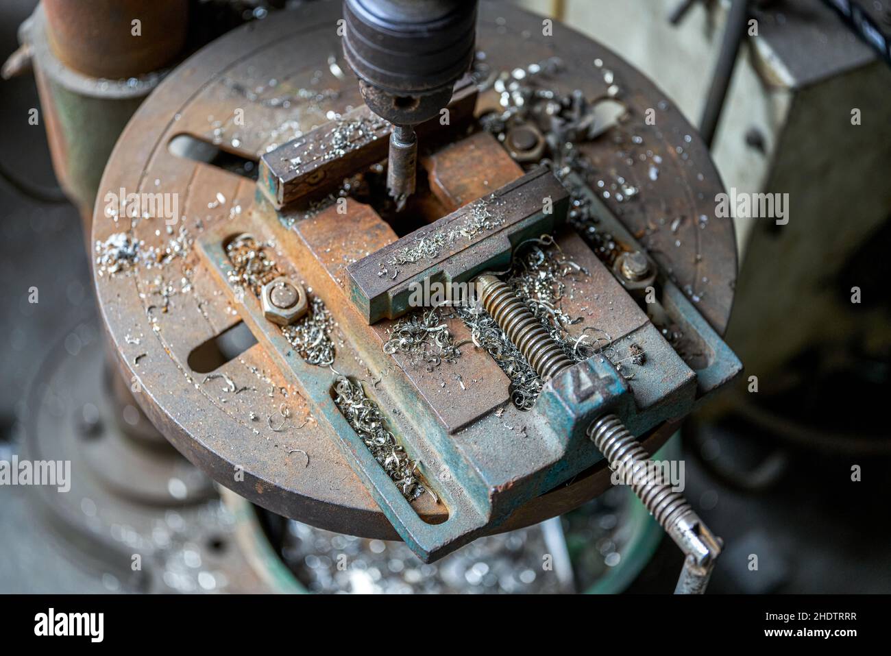 Close-up of platform of industrial small metal cutting milling machine ...