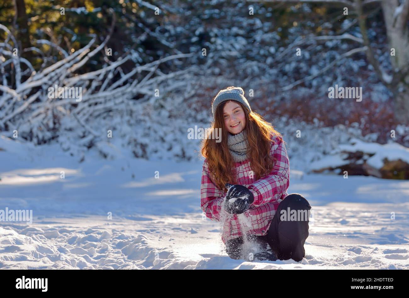 Girl looking at snowball hi-res stock photography and images - Alamy