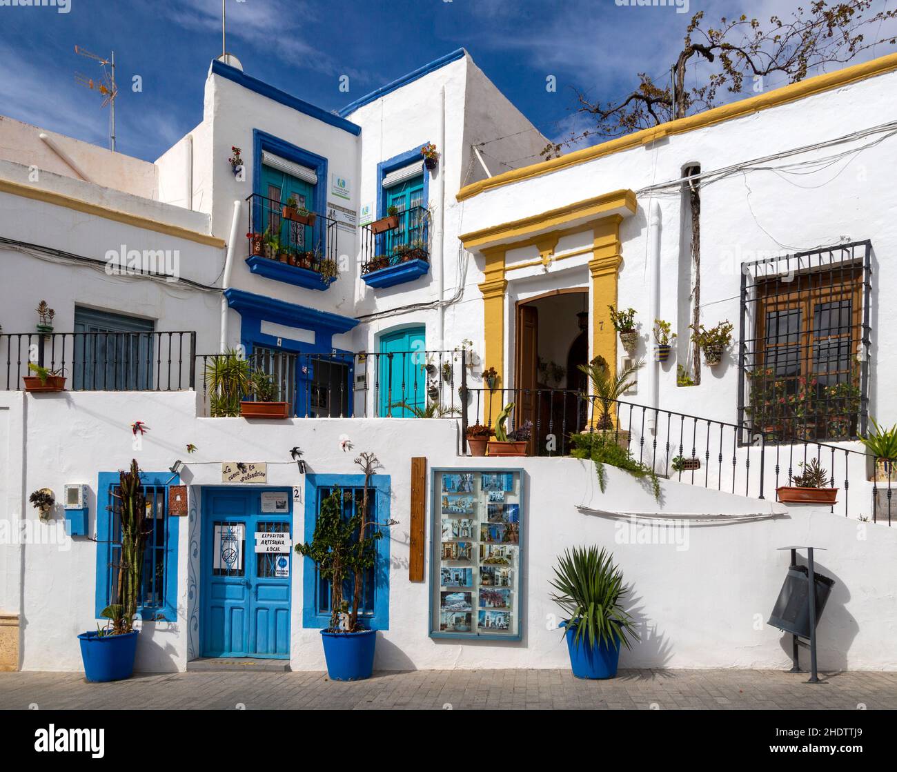 Colourful whitewashed historic buildings in town of Nijar, Almeria ...