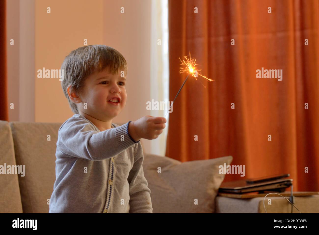 Kids holding sparklers hi-res stock photography and images - Alamy