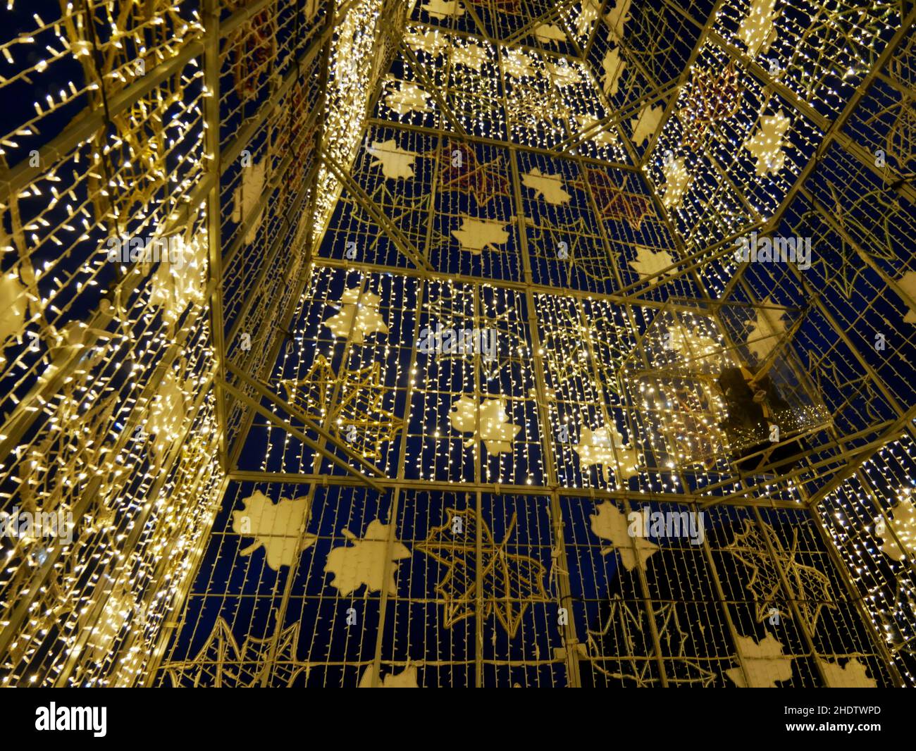A low angle shot of a building carcass from the inside with Christmas ...