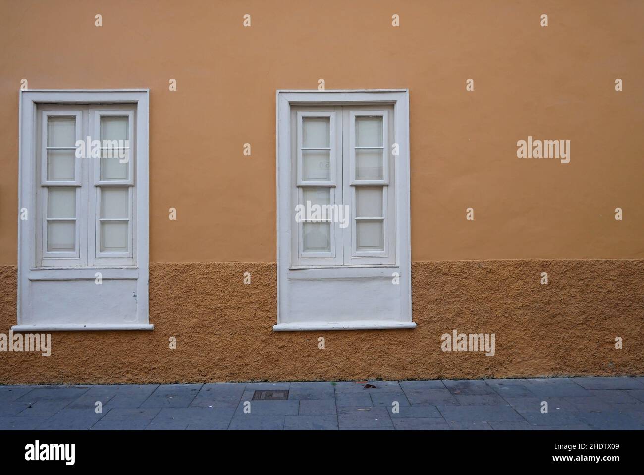 Front view of vintage white windows on the wall Stock Photo - Alamy