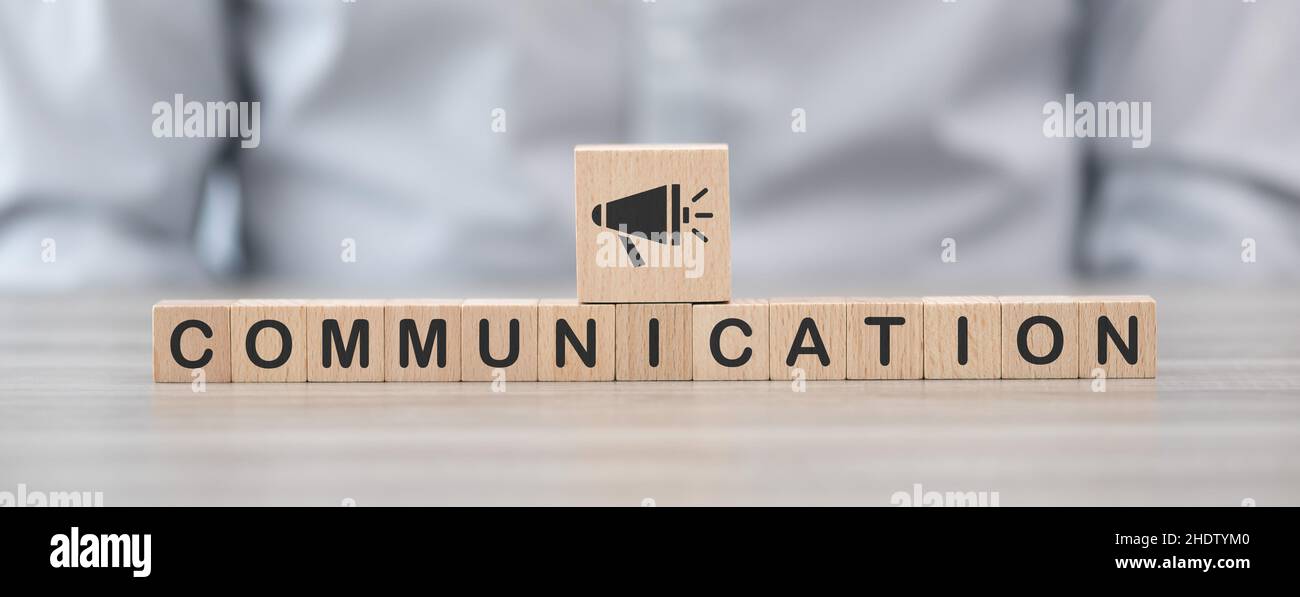 Wooden blocks with symbol of communication concept Stock Photo - Alamy