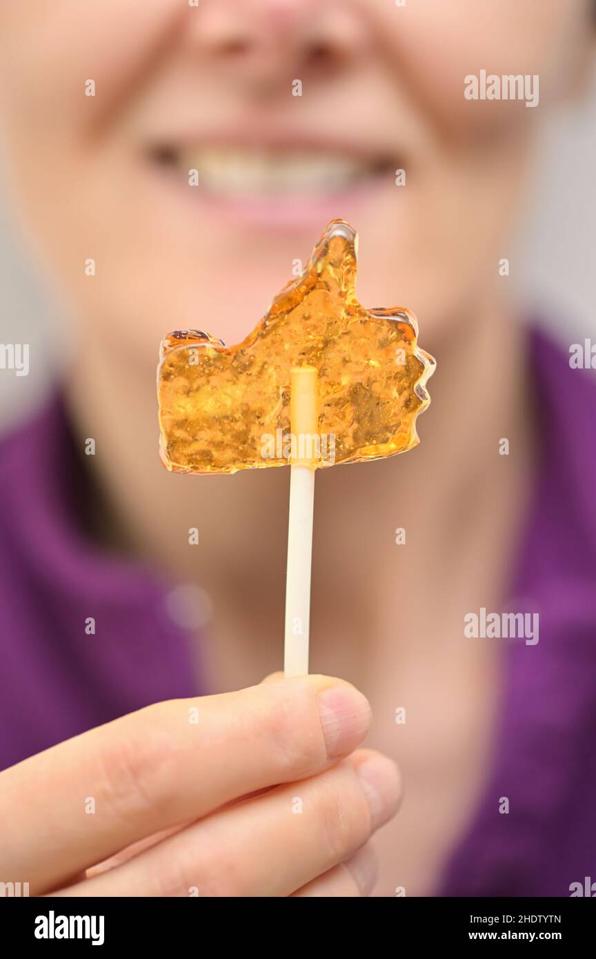 lollipop, thumbs up, like, lollipops, thumb ups Stock Photo - Alamy