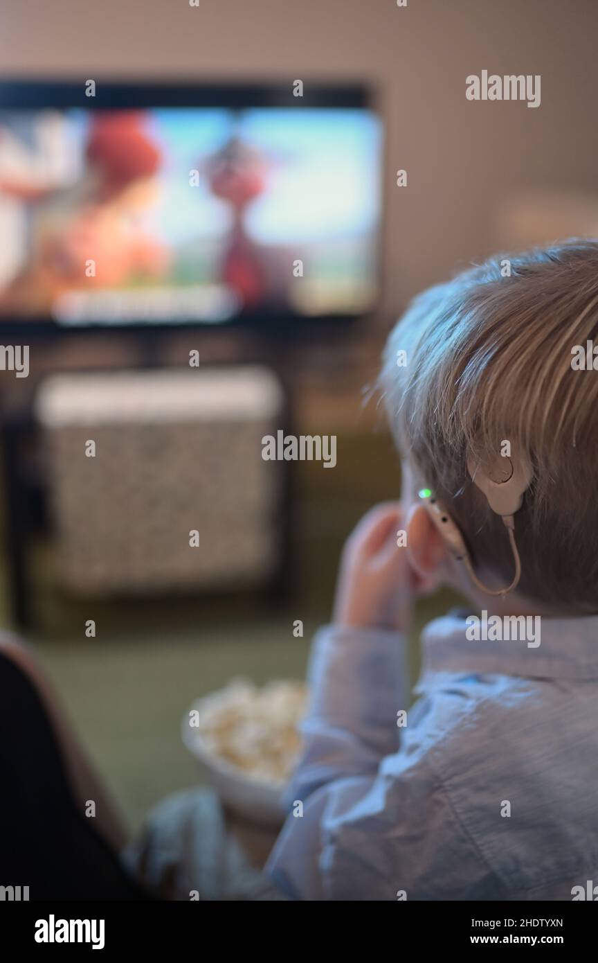 Woman hearing aid looking at camera hi-res stock photography and images ...