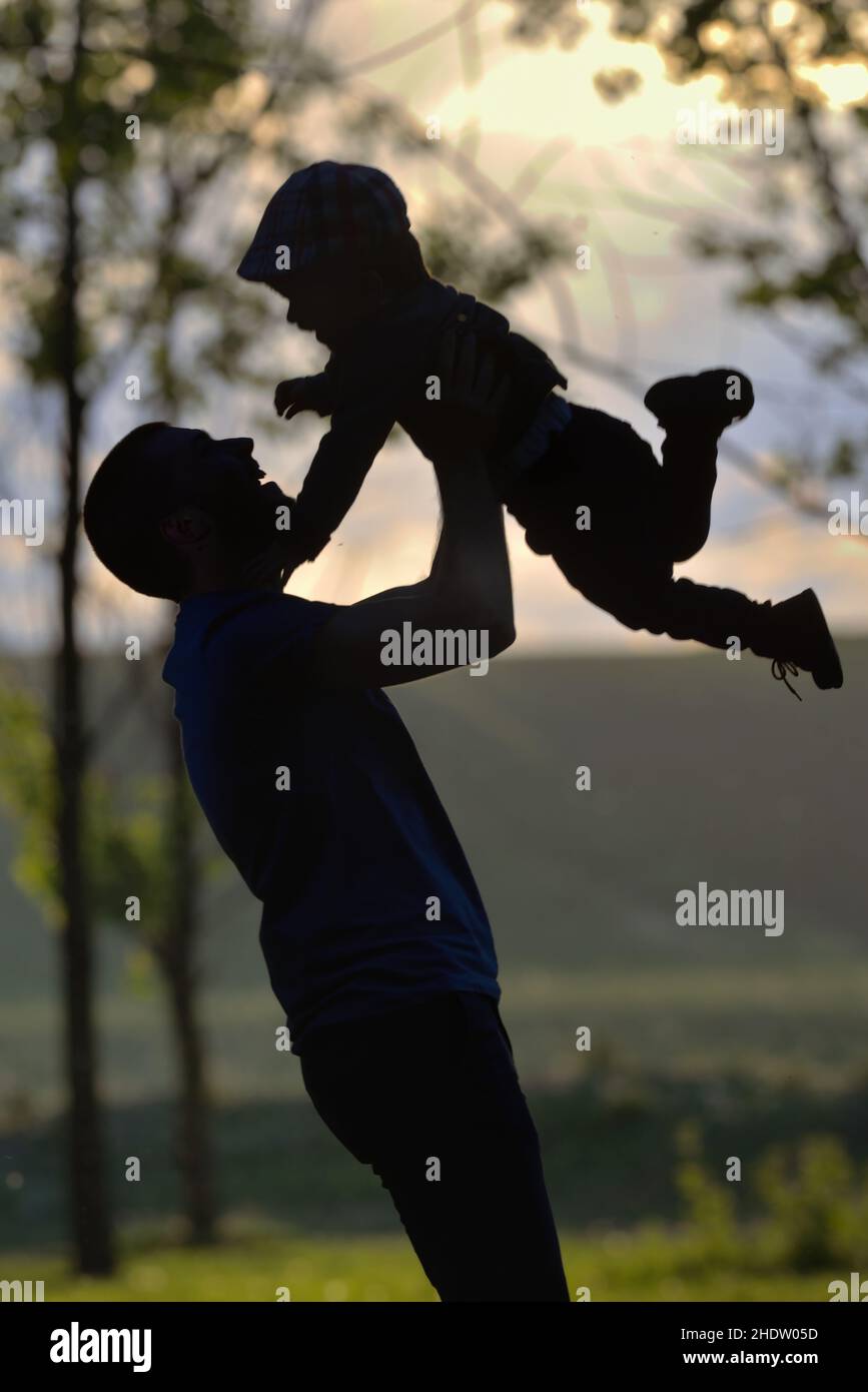 silhouette, son, tossing up, silhouettes, sons, tossing ups Stock Photo ...