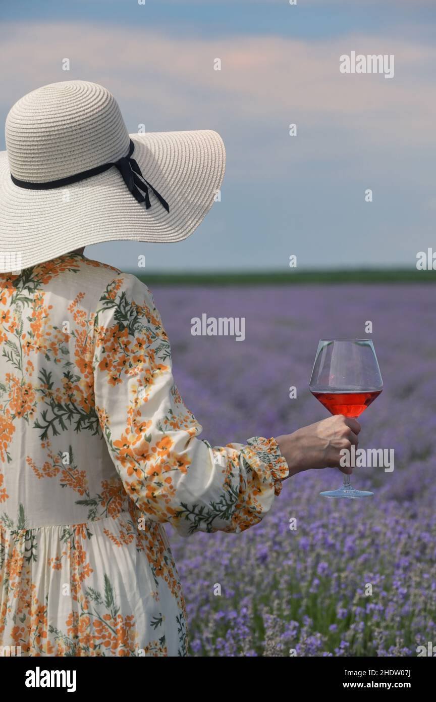 Woman wears red dress hi-res stock photography and images - Alamy