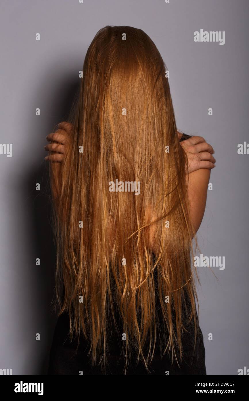 Girl's uncombed hair hi-res stock photography and images - Alamy