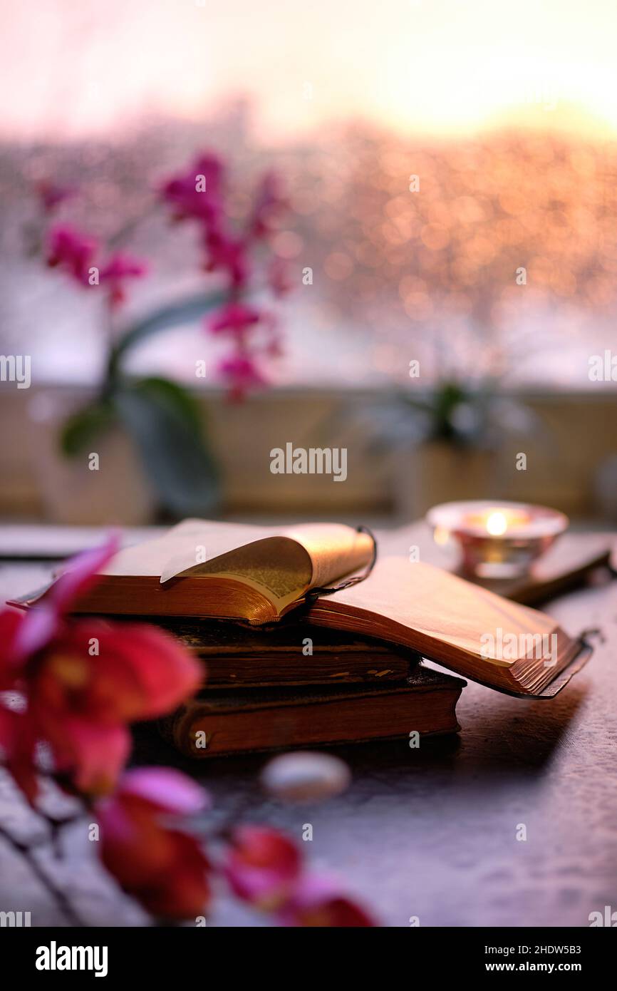 Old books candles hi-res stock photography and images - Alamy