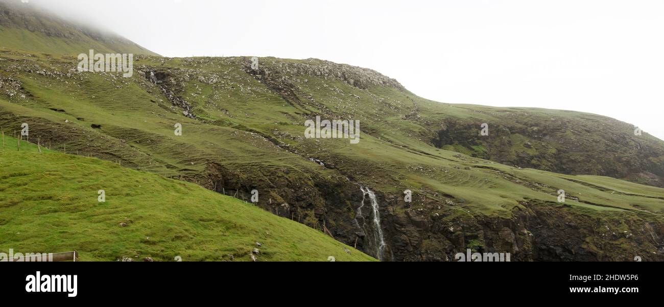 Landscape with waterfall in the faroe islands hi-res stock photography ...