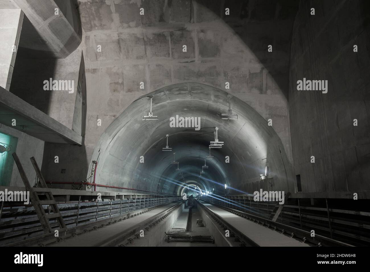 Underground facility with a big tunnel leading deep down. Metro ...