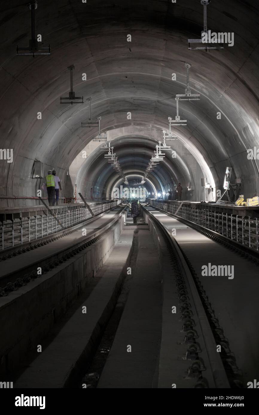 Underground facility with a big tunnel leading deep down. Metro ...
