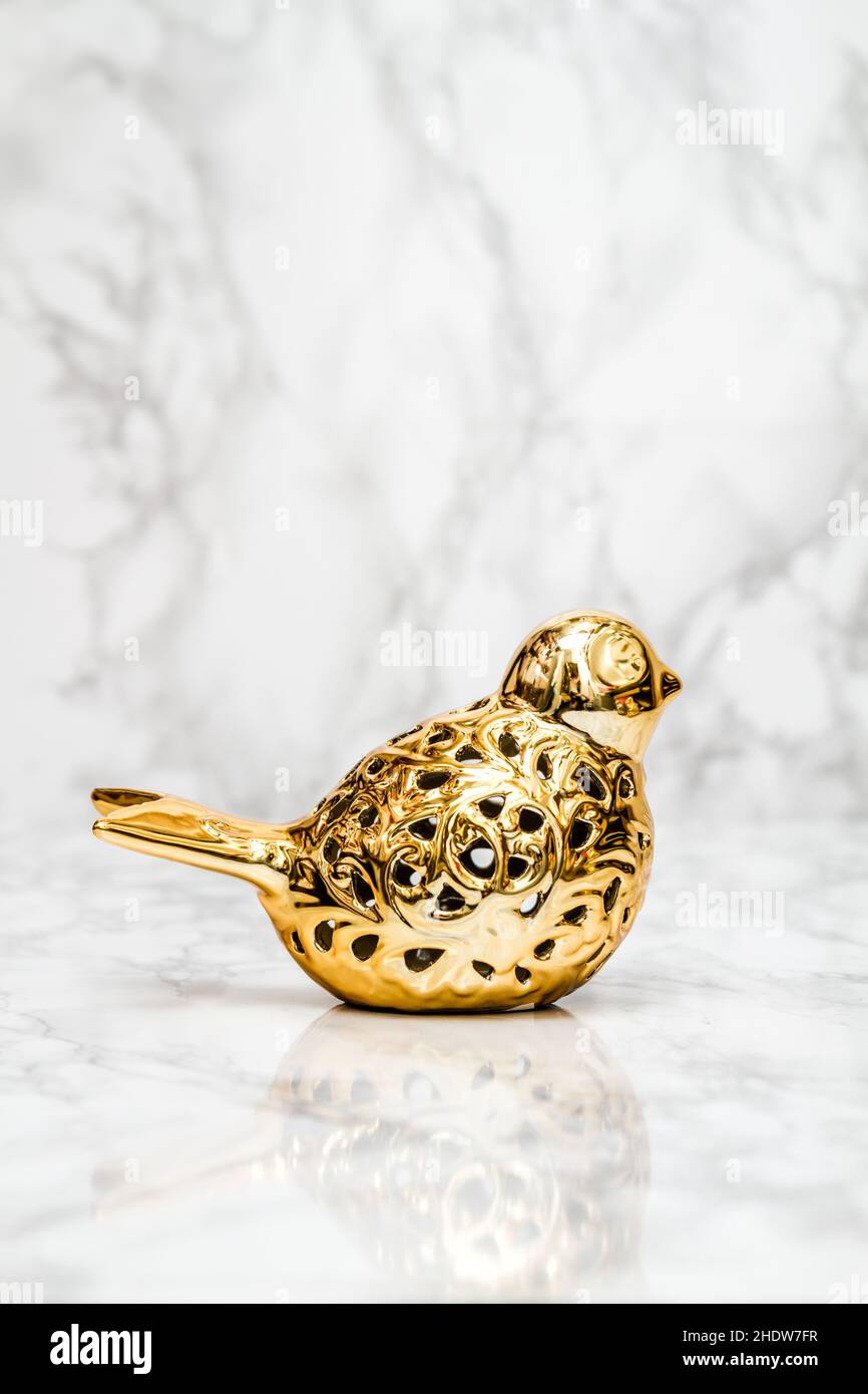Golden birds hi-res stock photography and images - Alamy