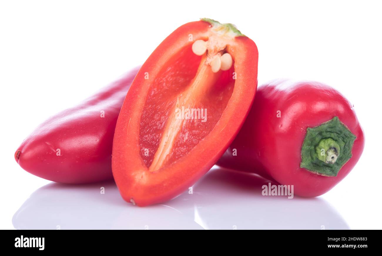 Fresh mini red peppers, isolated on white Stock Photo - Alamy