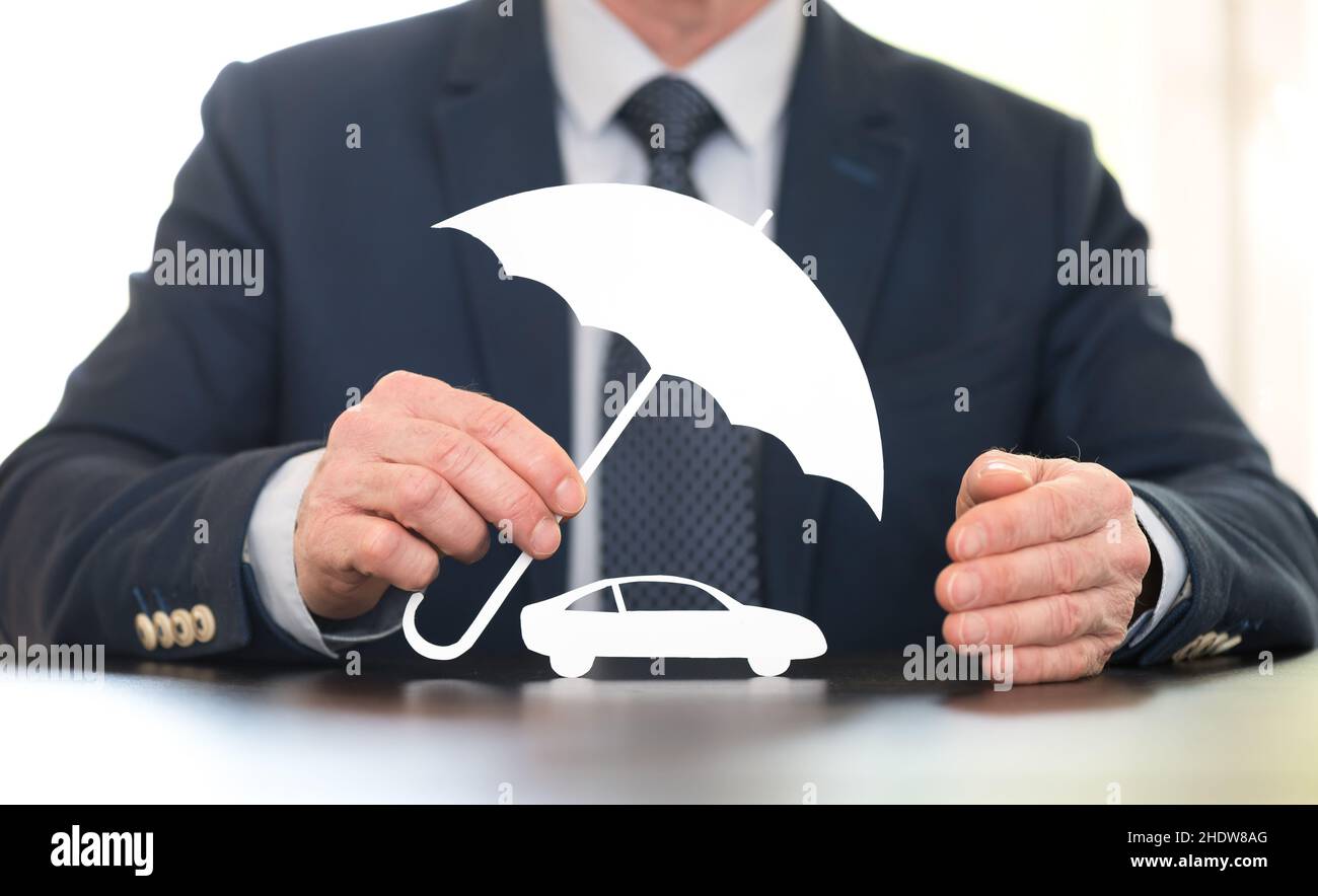 Symbol of auto coverage by a general agent Stock Photo - Alamy