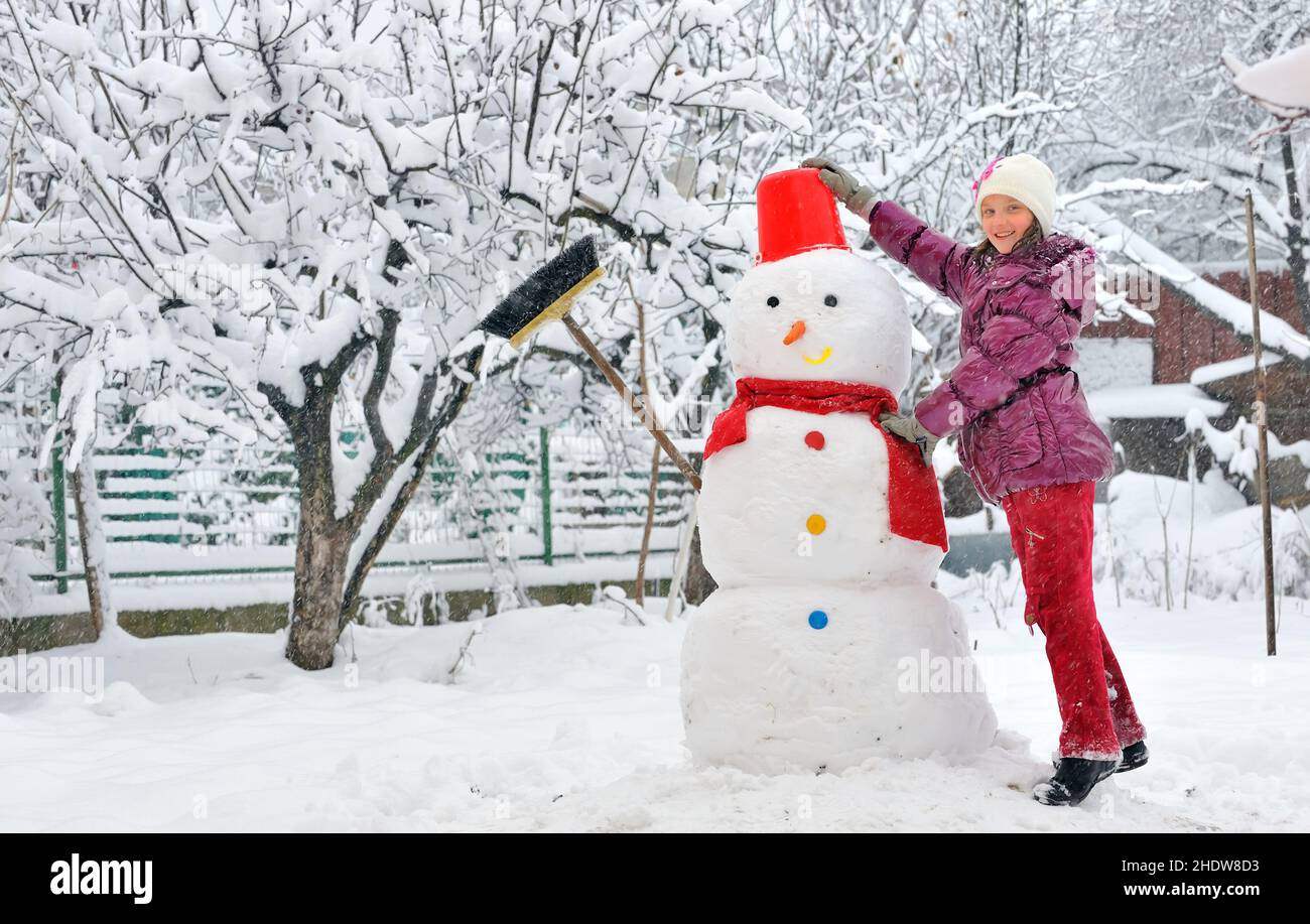 girl, winter, snowman, girls, winters, snowmen Stock Photo - Alamy