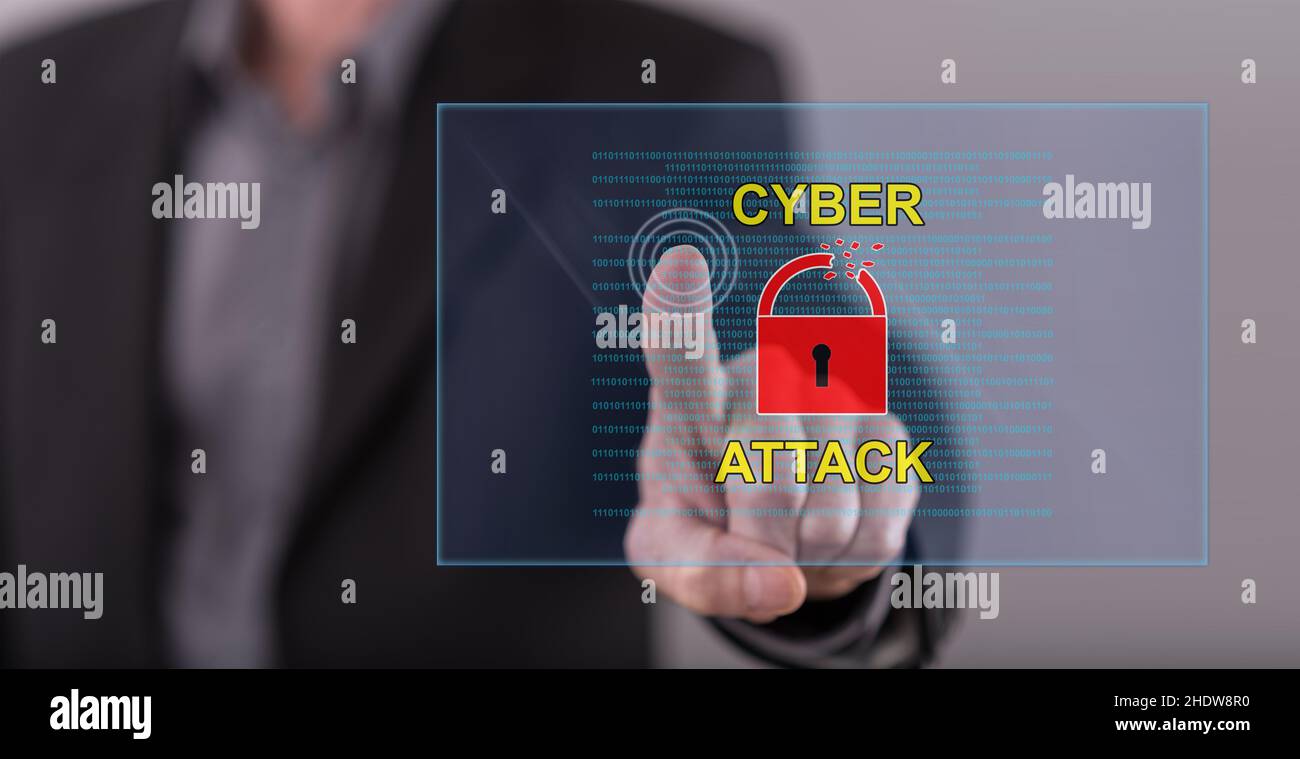 Man touching a cyber attack concept on a touch screen with his finger ...