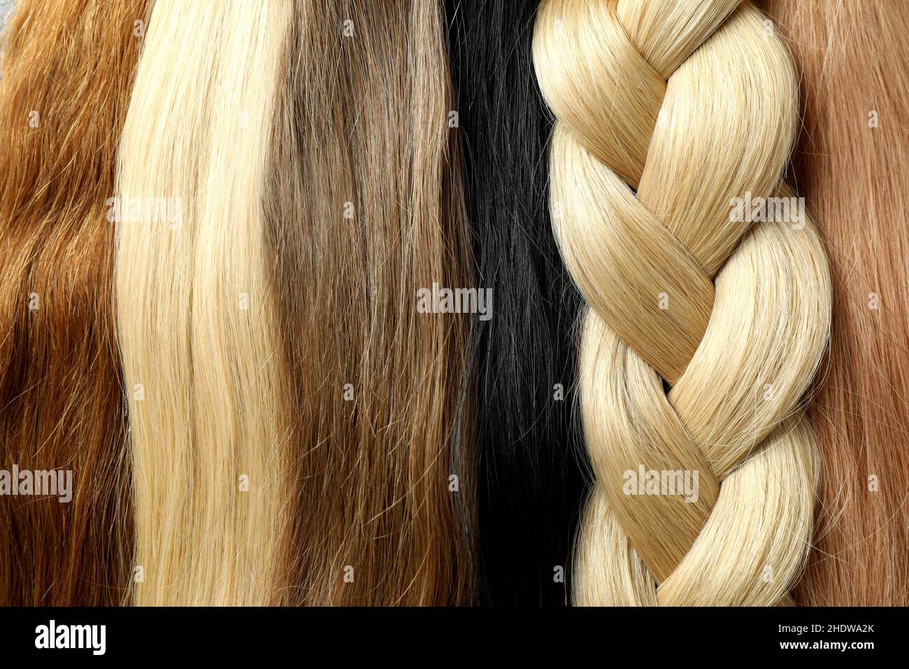 Different color female hair on whole background, close up Stock Photo ...