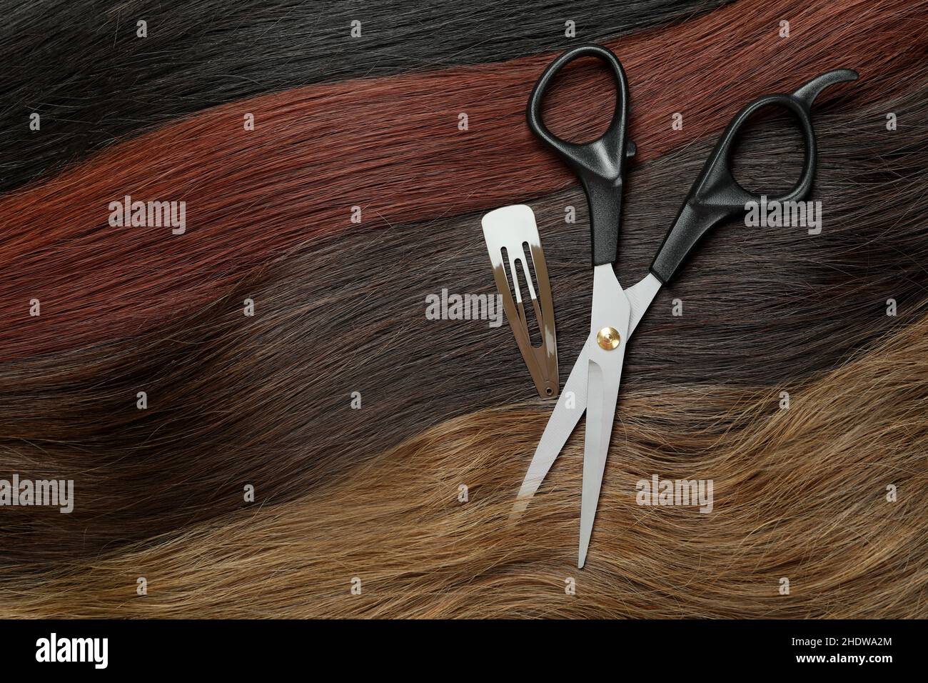 Female hair, hair clip and scissors, close up Stock Photo - Alamy