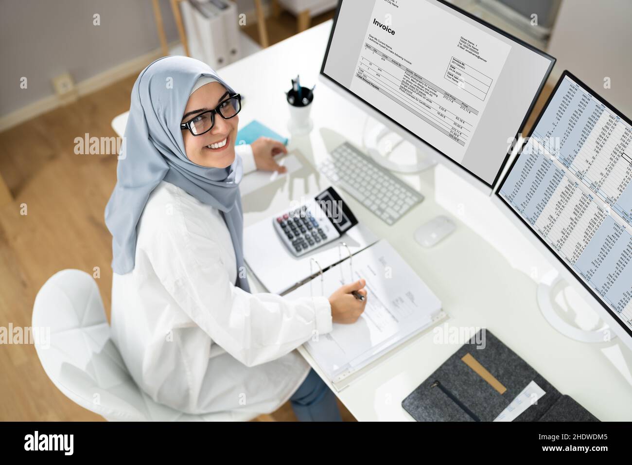 Business Tax And Invoice Audit Using Office Computer Stock Photo - Alamy