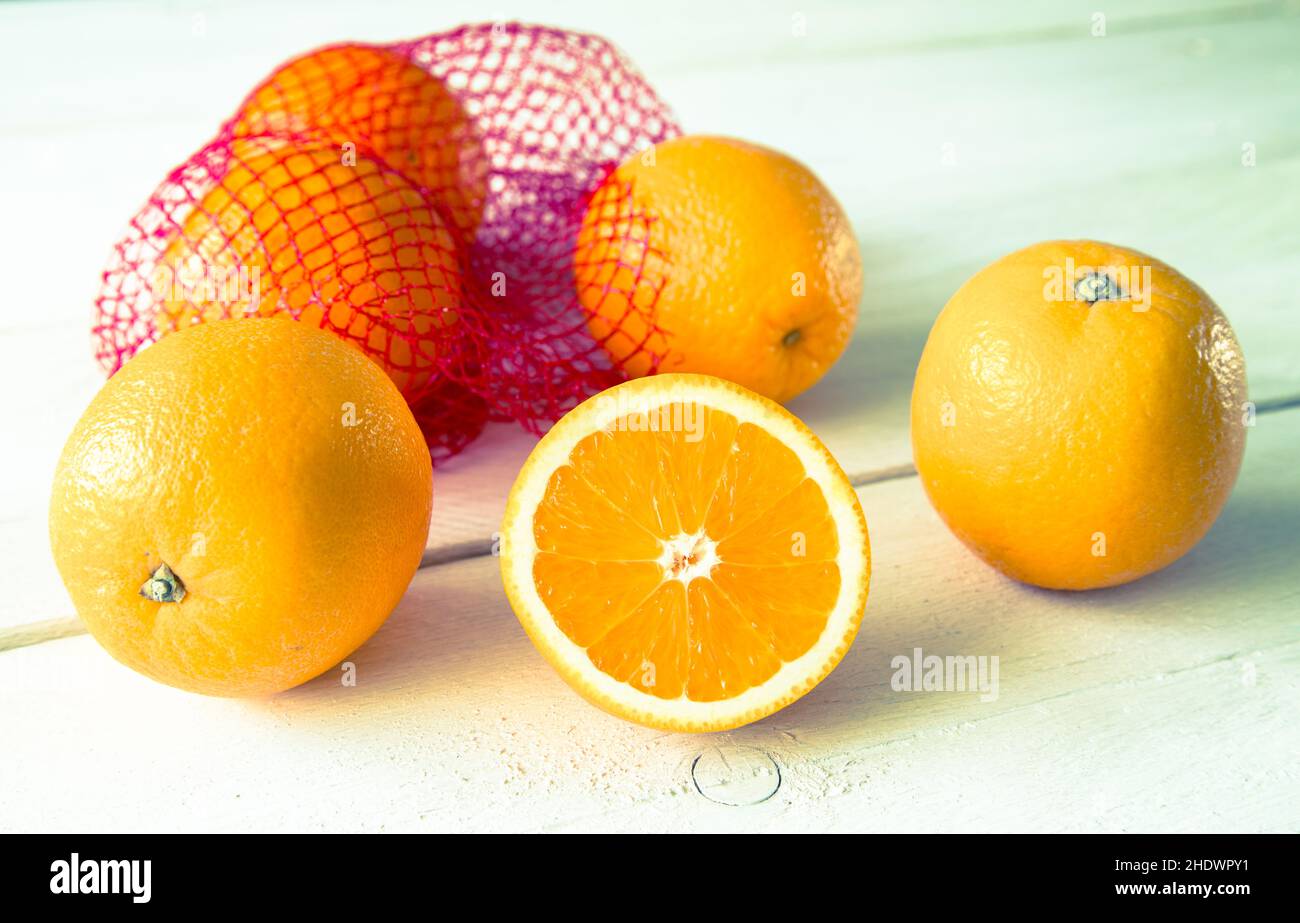 Nets of oranges hi-res stock photography and images - Alamy