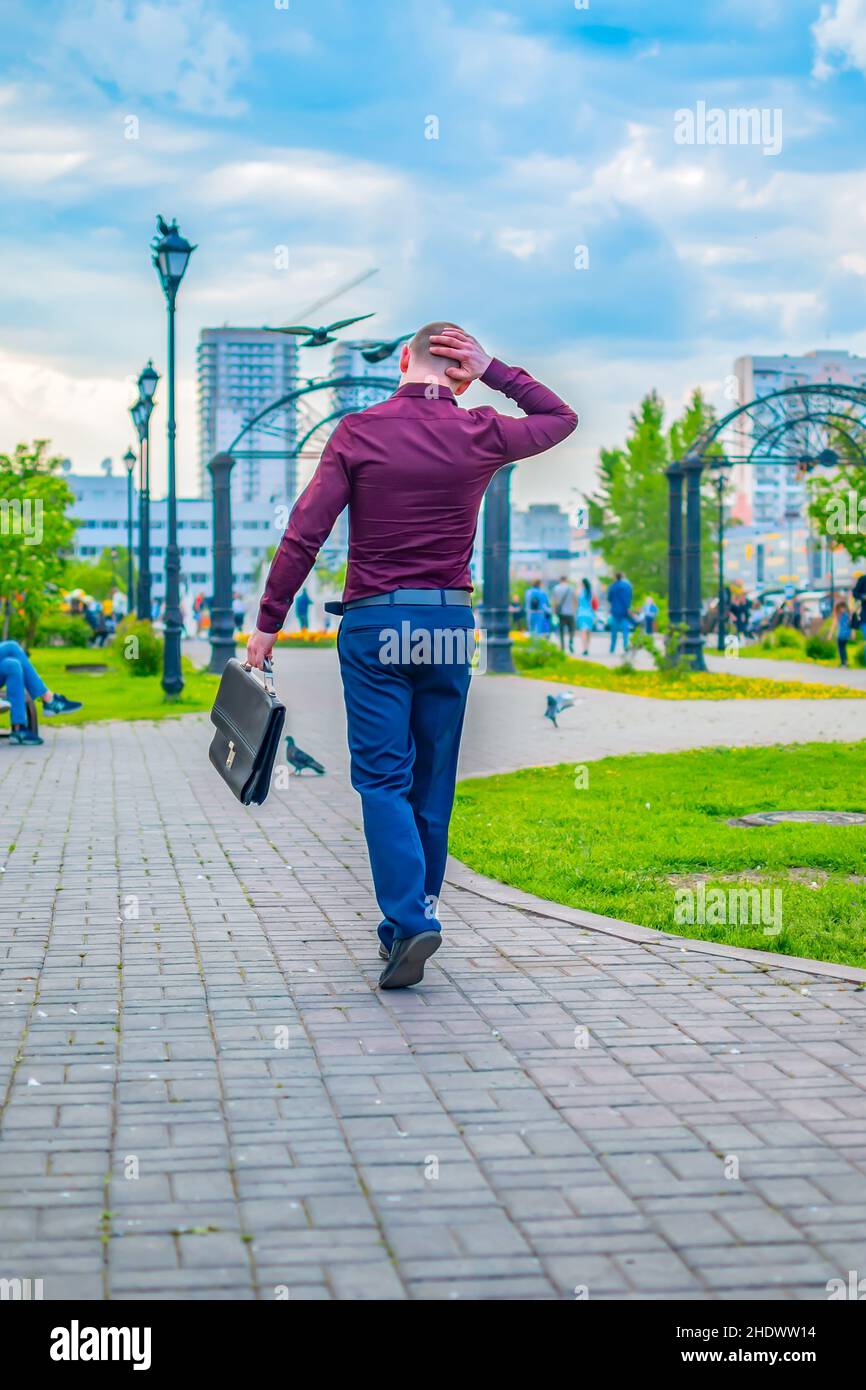 Man carrying a briefcase hi-res stock photography and images - Alamy