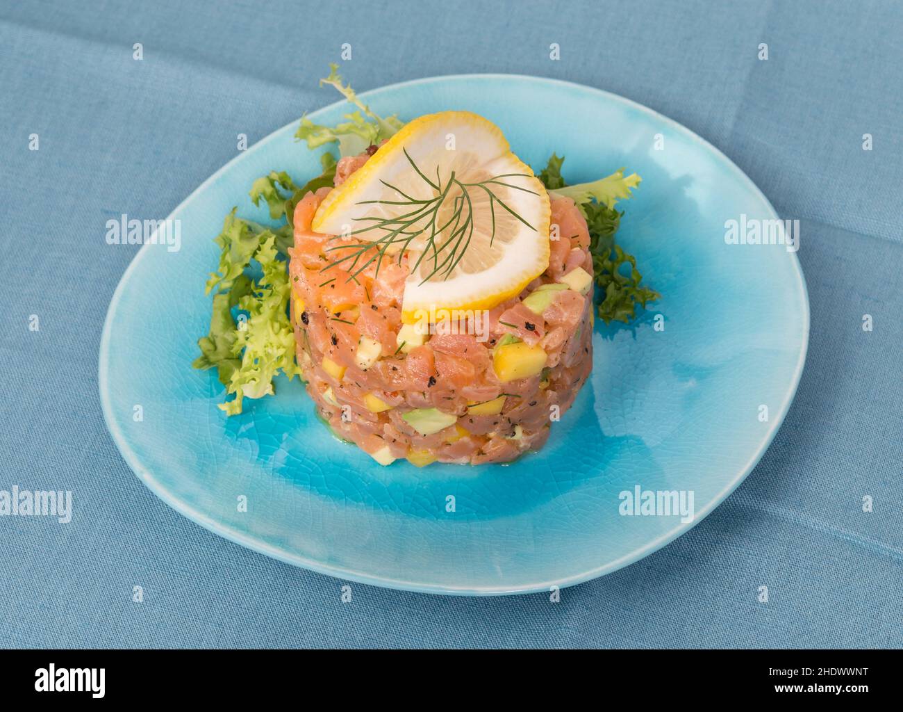 Tartar salmon avocado served hi-res stock photography and images - Alamy