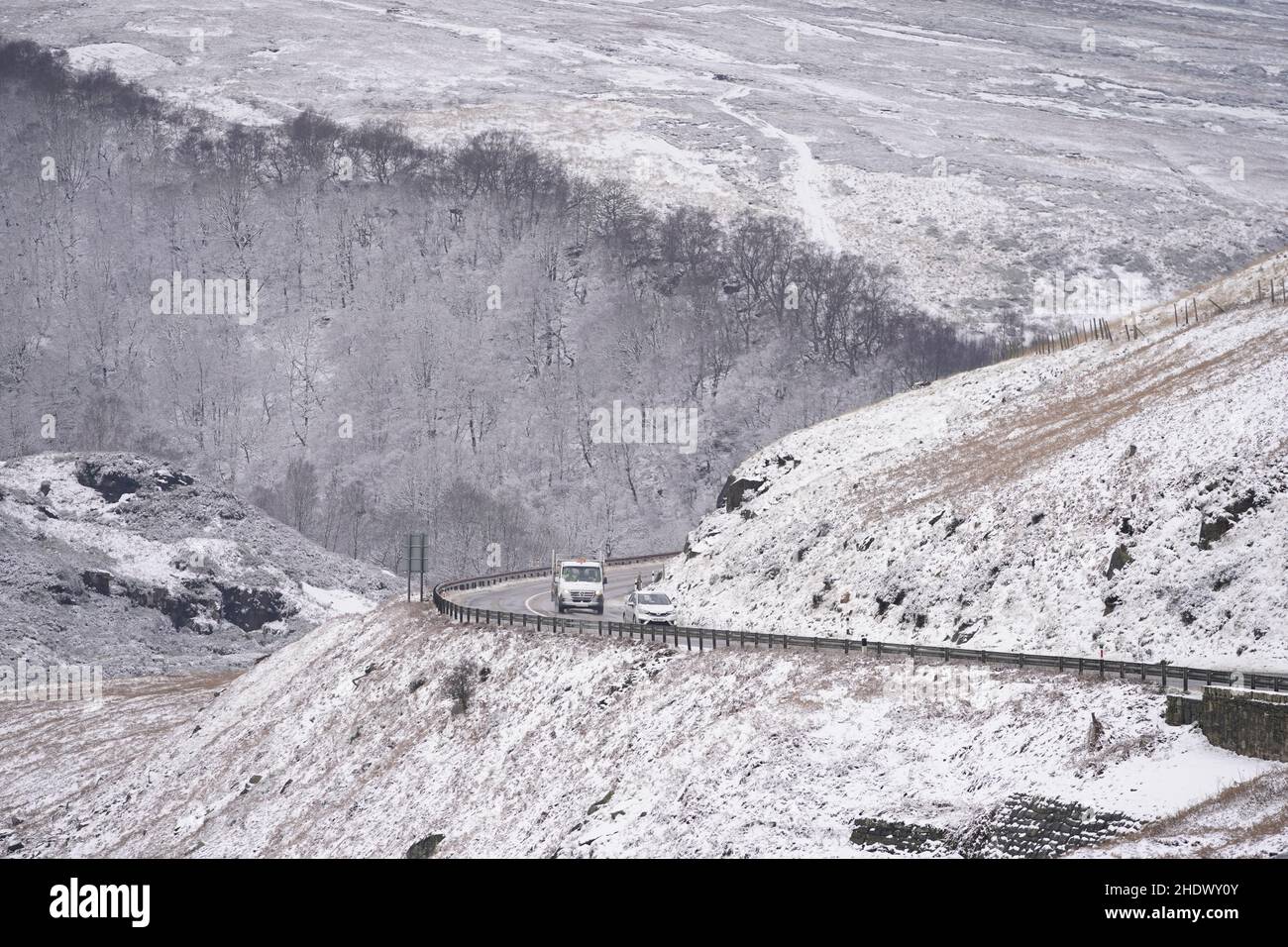 Vehicles navigate fresh snow fall on A628 at Woodhead pass. Picture ...