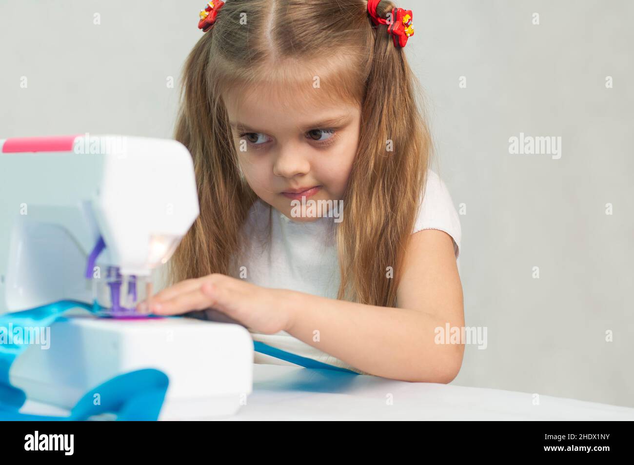 Sewing machine toy hi-res stock photography and images - Alamy