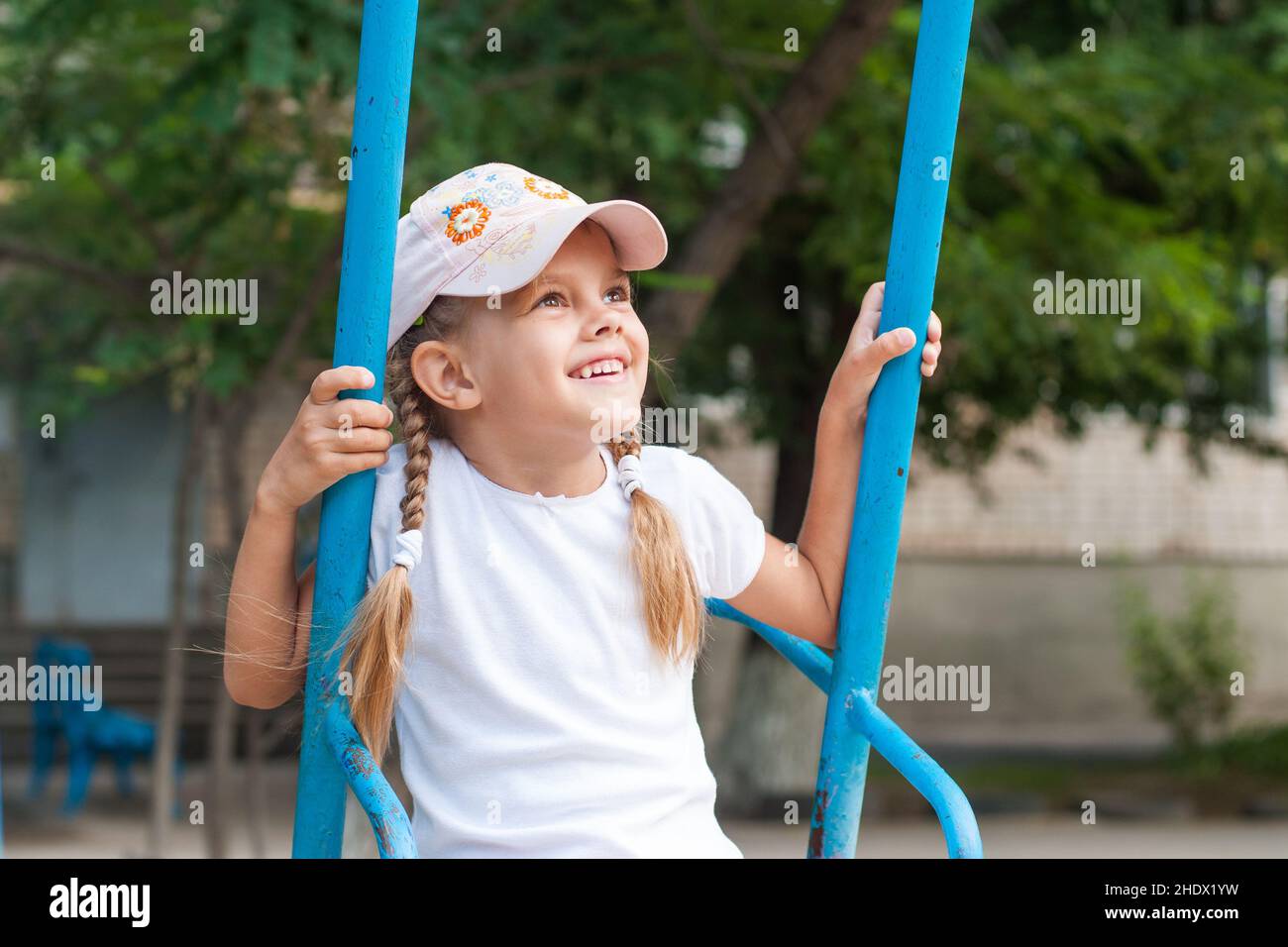 Laugh girl kid braids hi-res stock photography and images - Alamy