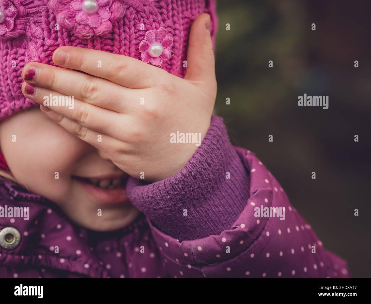 Children hide hand hi-res stock photography and images - Alamy