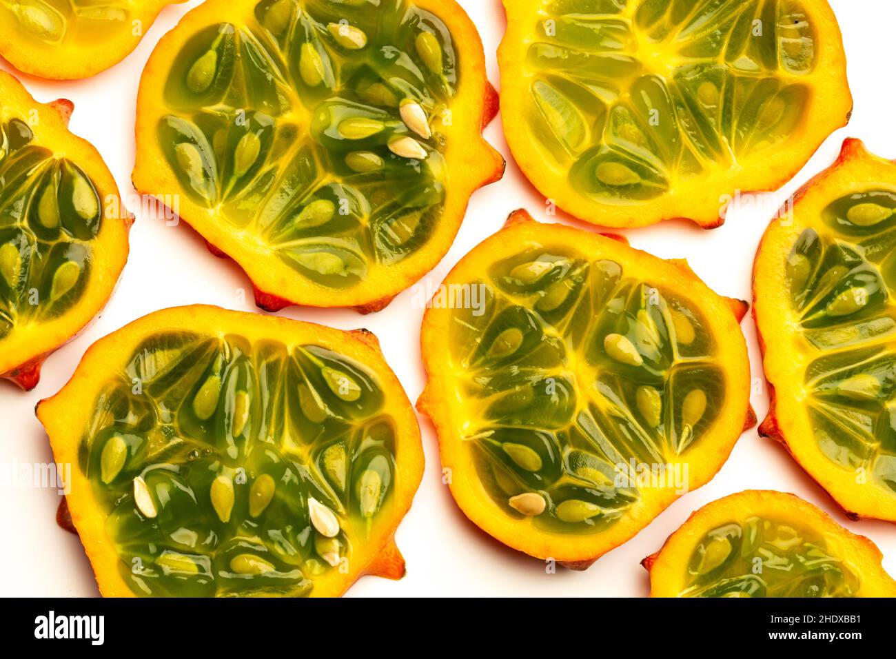 Kiwano fruit slices background Stock Photo - Alamy