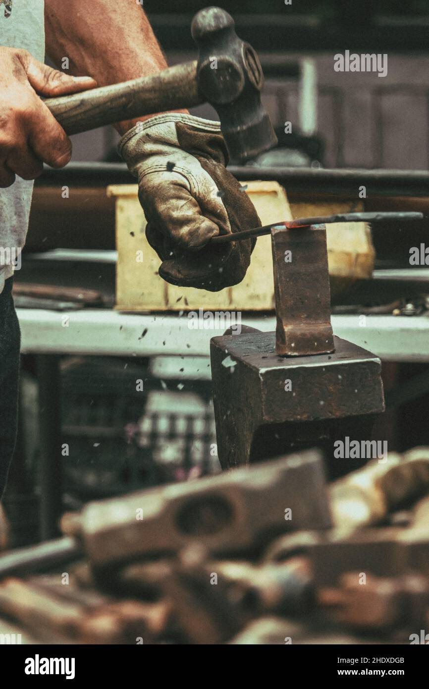Blacksmith steel hammering hi-res stock photography and images - Alamy