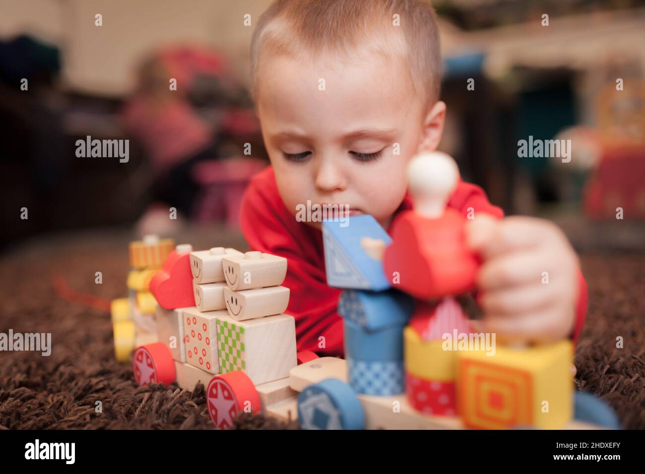 Children playing boys toys hi-res stock photography and images - Alamy
