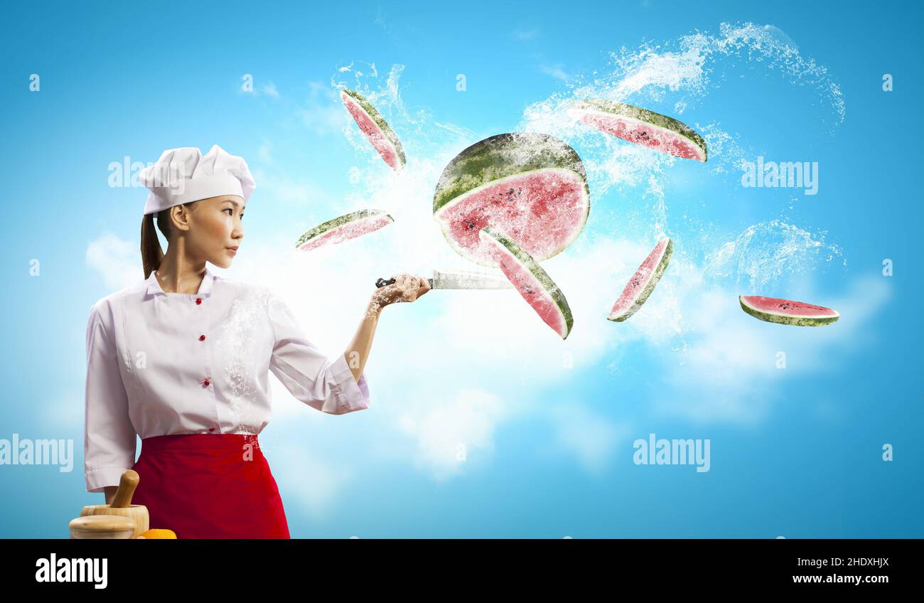 Cutting melon hi-res stock photography and images - Alamy
