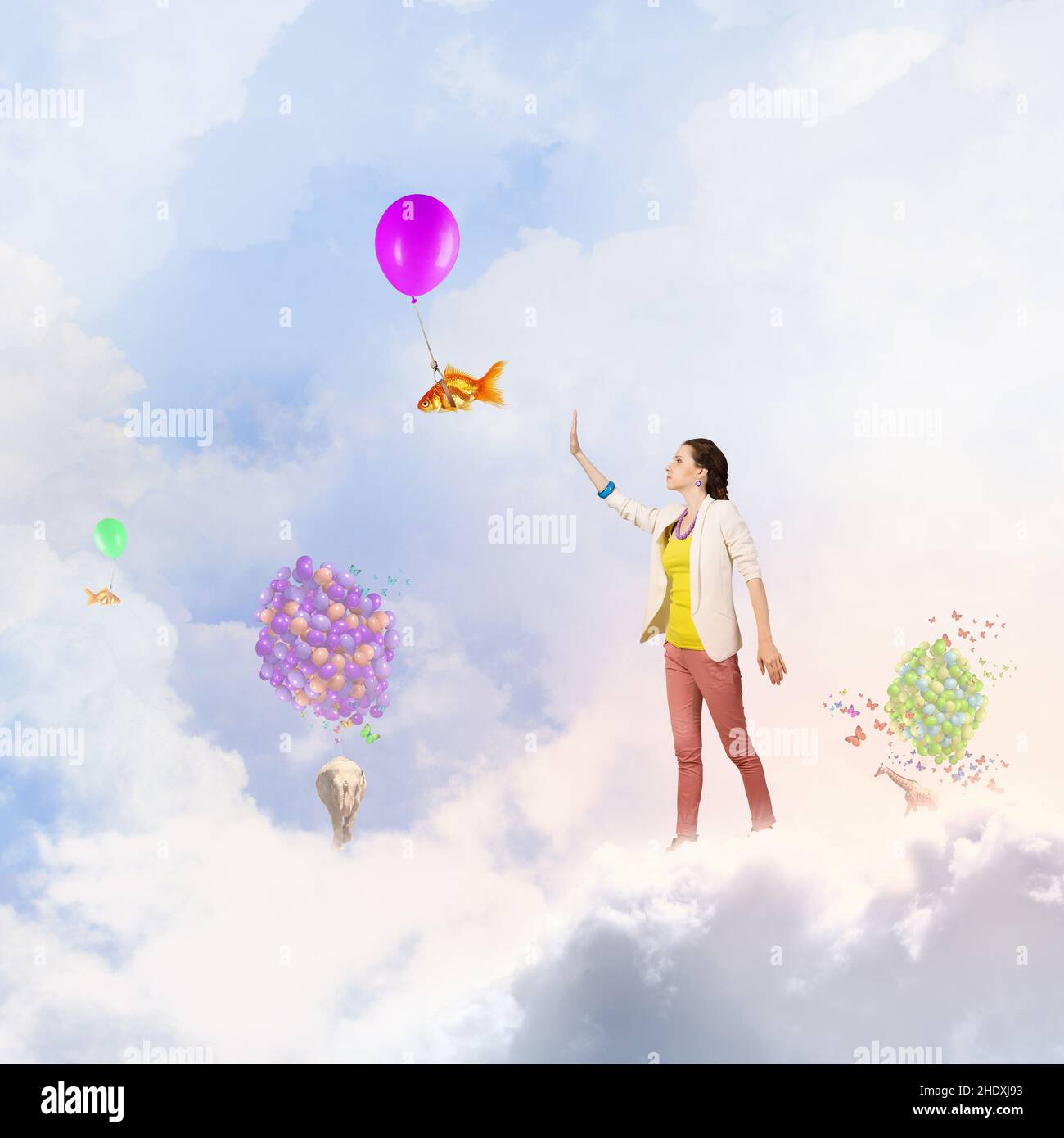 Surreal woman flying hi-res stock photography and images - Alamy