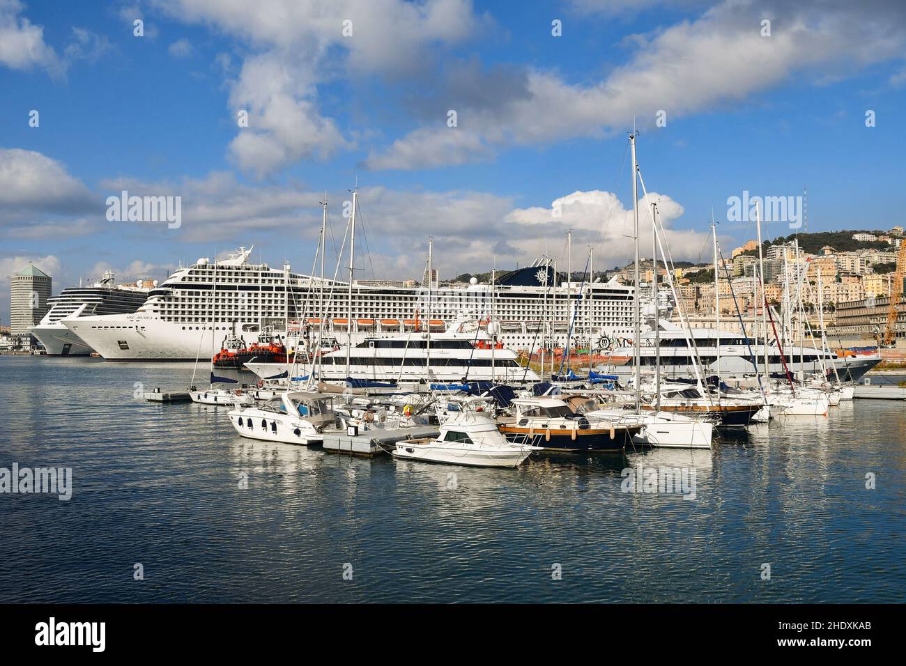View of the harbor with moored boats, yachts, cruise ships and the ...